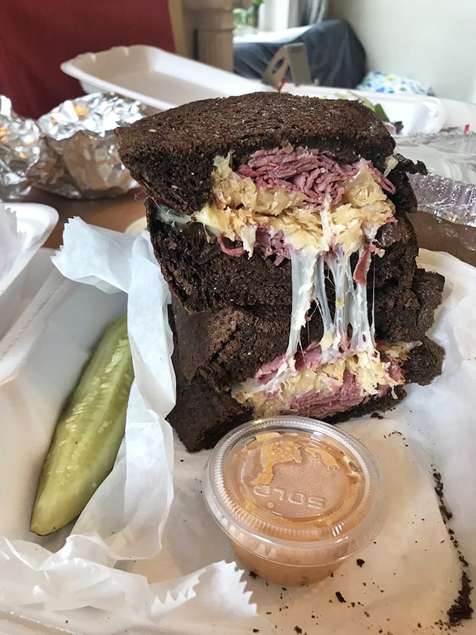 The Reuben at Big Jim's doesn't just stack corned beef—it creates a skyscraper of flavor between dark rye foundations. Melty, messy perfection.
