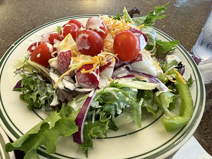 A salad that doesn't apologize for being healthy—it's too busy showing off those garden-fresh veggies and that rainbow of colors. Guilt-free deliciousness.