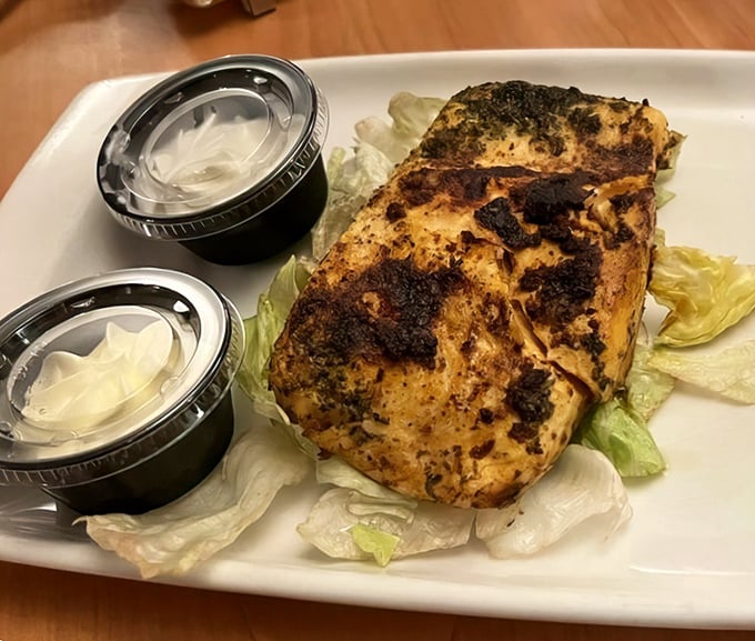 For those taking a break from the beef brigade, this perfectly seared salmon offers a lighter—but no less delicious—path to satisfaction.