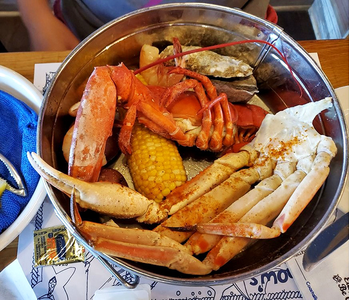 The Low Country boil—where crab legs, corn, and potatoes unite in a steaming metal bucket of seasoned perfection.