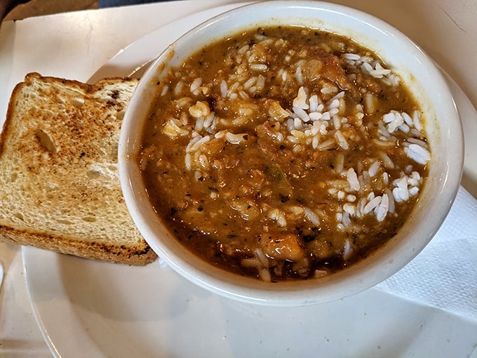 A bowl of gumbo that could make a New Orleans chef tip his hat—rice soaking up that rich, soulful broth.