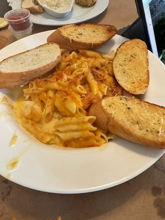Mac and cheese gets the Maryland makeover, with toasted garlic bread standing by for the sacred duty of sauce-sopping.