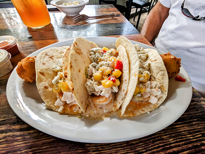 Fish tacos that make you wonder if you've been doing Taco Tuesday wrong your entire life. That mango salsa is practically performing miracles.