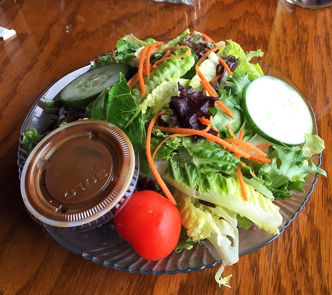 Even the side salad gets the star treatment—crisp, colorful, and fresh enough to make you momentarily forget you came for seafood.