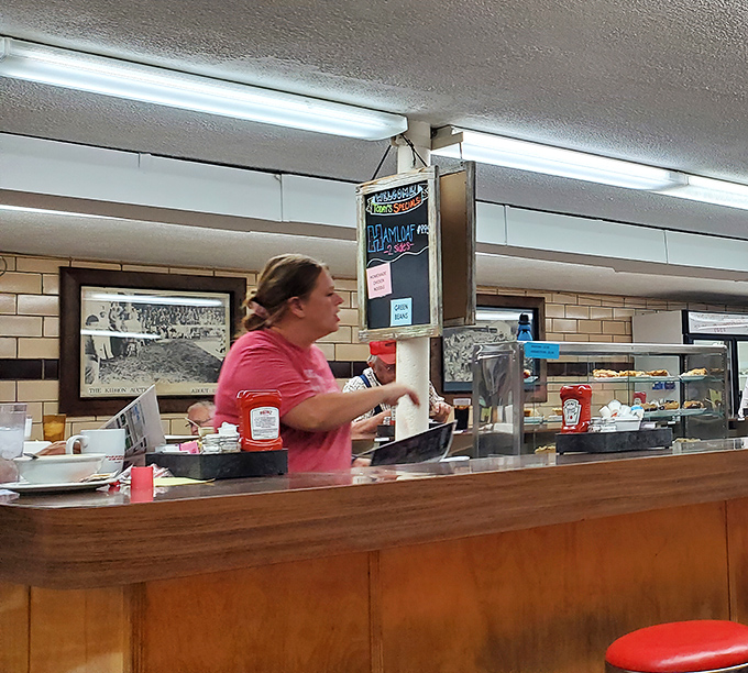 The kitchen staff moves with the choreographed precision of people who know breakfast isn't just a meal—it's a mission.