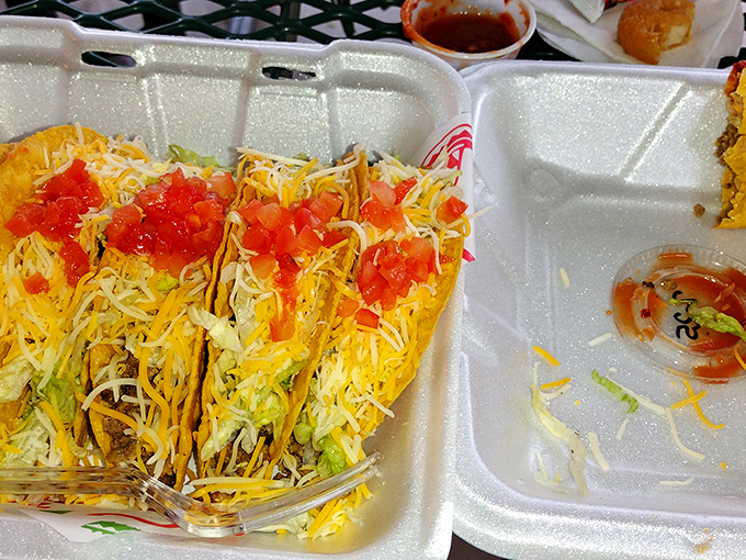 These aren't just tacos—they're edible postcards from the Southwest, loaded with cheese and served with zero pretension.