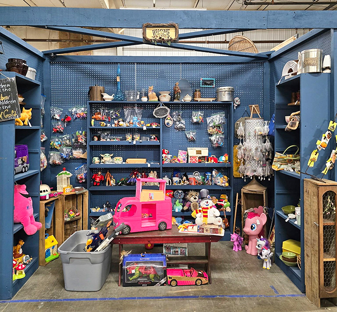 Childhood dreams, neatly organized. This blue-walled wonderland of toys spans generations – from Barbie's pink convertible to My Little Pony's colorful squad.