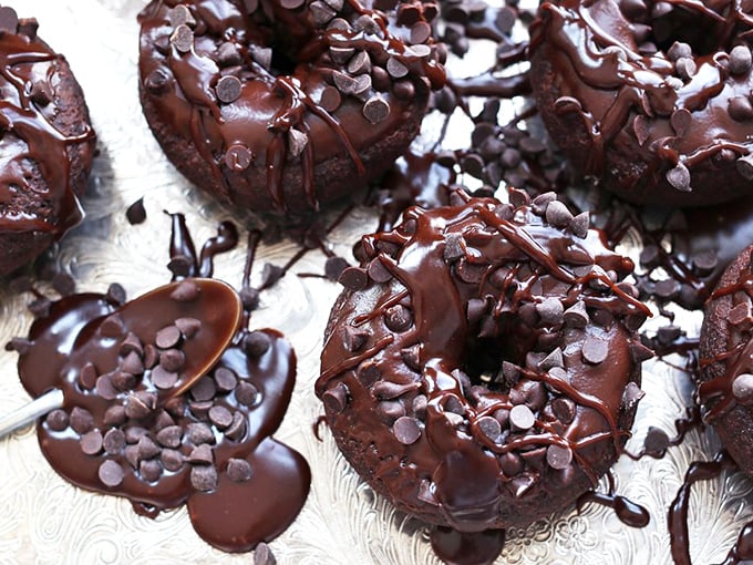 These chocolate donuts aren't just topped with chocolate chips—they're wearing chocolate armor, ready for battle with your taste buds.