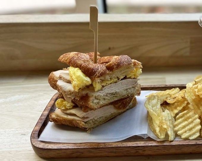 A breakfast sandwich that understands the importance of proper architecture – golden bread, perfectly folded egg, and tidy presentation. Napkins optional but recommended.