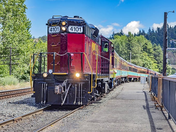 Engine 4101 stands ready for adventure, its vibrant colors a striking contrast against the lush Oregon landscape—mechanical beauty meeting natural splendor.