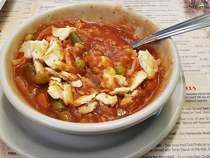 Comfort in a bowl—this hearty vegetable soup with chunks of chicken looks like what grandma would make if grandma had been cooking for half a century.