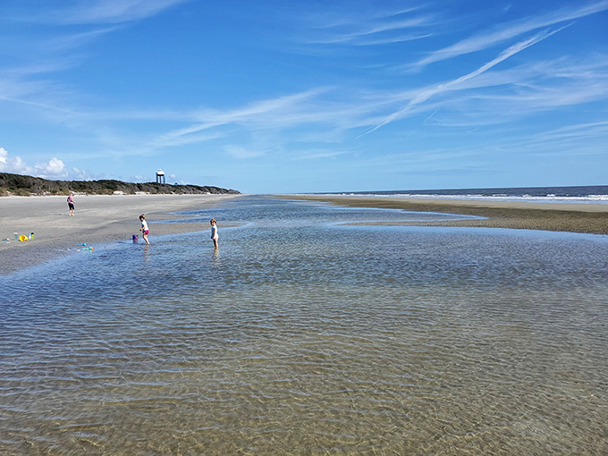 Shallow tide pools create nature's perfect wading pools. Even adults rediscover childlike wonder in these warm, crystal-clear waters.
