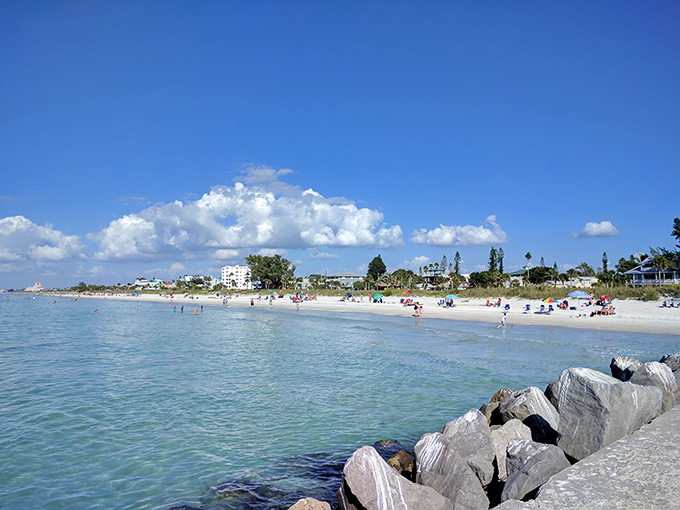 Beach day perfection! The pristine shoreline offers plenty of space to spread out—unlike those sardine-can beaches near the mega-resorts.