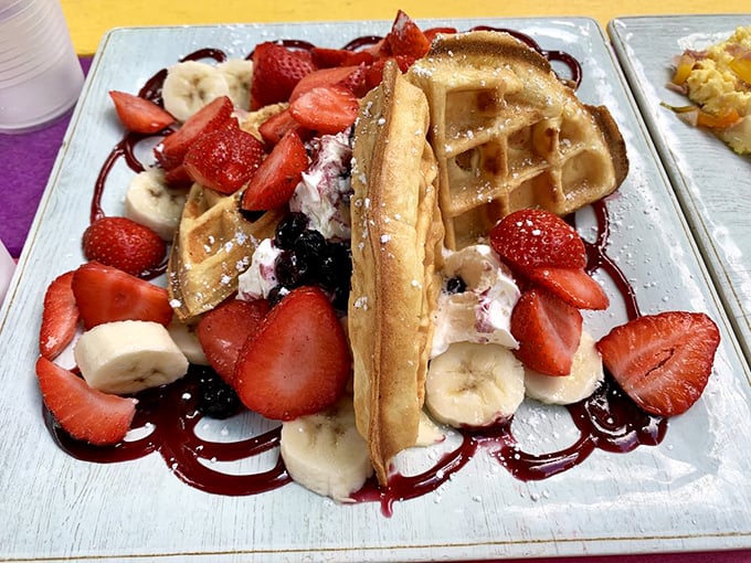Not just a waffle—a celebration plate where berries, bananas and cream transform breakfast into an edible art installation.