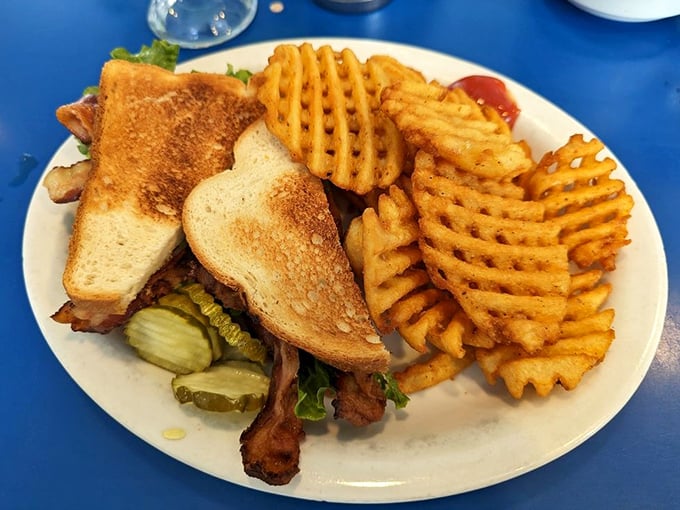 The humble sandwich gets the royal treatment with these waffle fries – crispy on the outside, fluffy inside, and geometrically satisfying to boot.