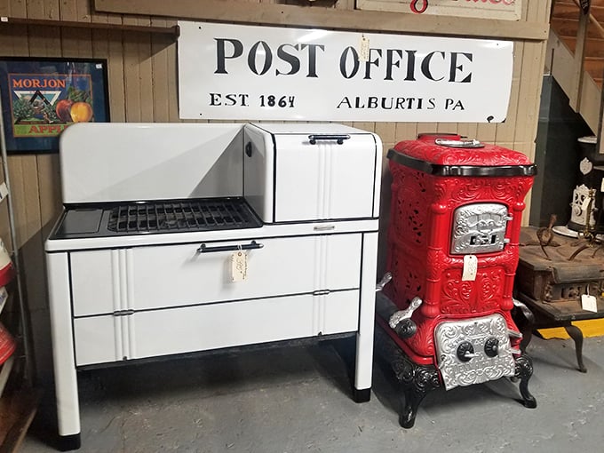 That red cast iron stove isn't just kitchen decor—it's a portal to Sunday dinners before microwaves ruled the world.