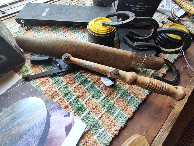Craftsman tools that built America, displayed on colorful vintage textiles. These weren't made to be replaced next season—they were made to last generations.
