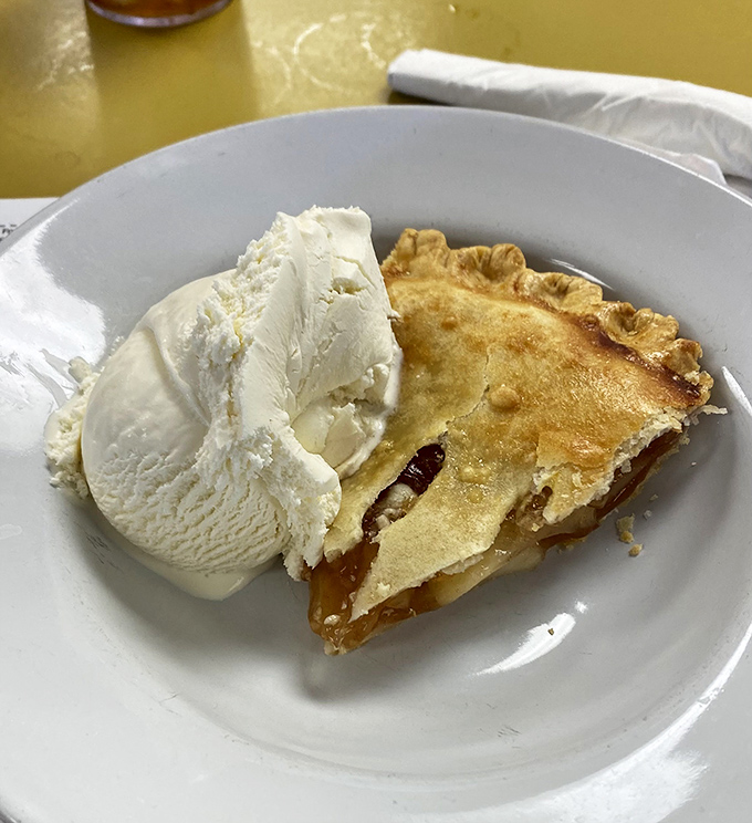 Apple pie à la mode: where warm cinnamon-spiced fruit meets cold vanilla ice cream in a romance more compelling than any Hollywood blockbuster.