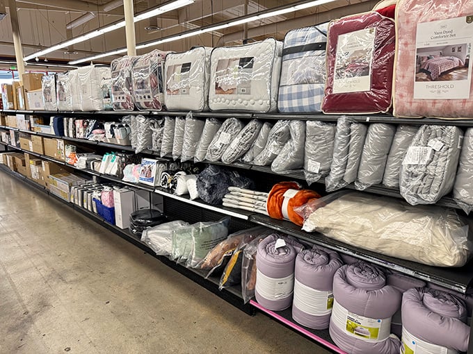 Bedding displays that promise the sleep of royalty without requiring the treasury of a kingdom to purchase.