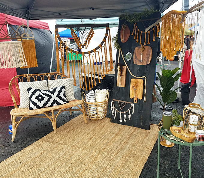 A bohemian oasis amid industrial concrete, where rattan furniture and macramé wall hangings transport you straight back to 1975.