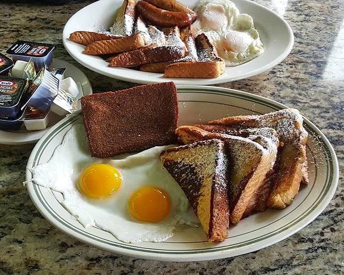 When breakfast looks this good, you understand why people set alarms. Toast, eggs, and bacon—the holy trinity of morning bliss.