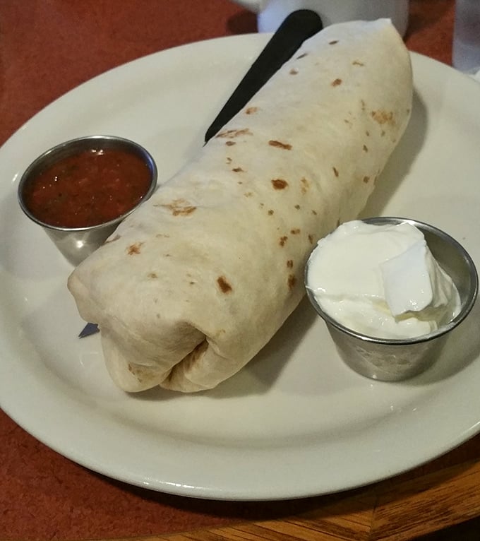 The breakfast burrito—a tortilla-wrapped miracle that somehow manages to stay intact until the last bite. Engineering meets breakfast.