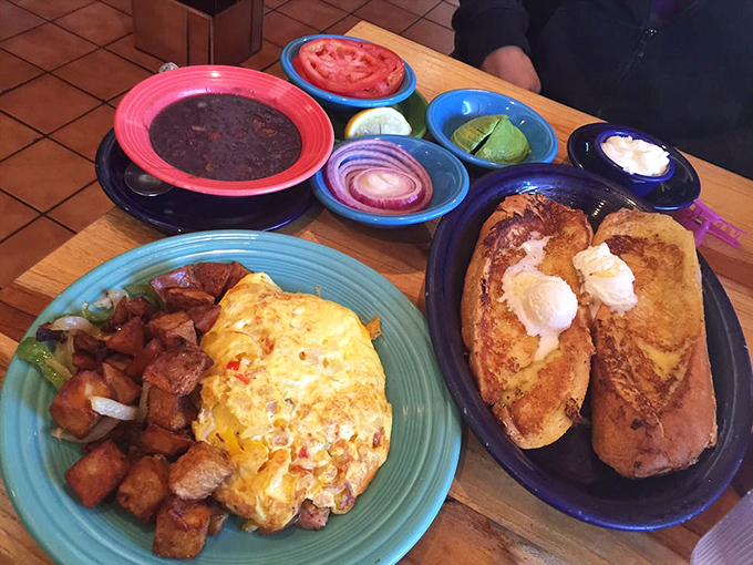 A breakfast fiesta that puts ordinary morning meals to shame. The French toast looks like it's auditioning for a food magazine cover – and getting the part.