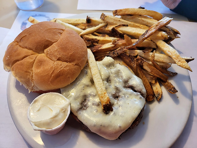 When a diner serves a cheeseburger with hand-cut fries, you know they're not just going through the motions—they're making a statement.