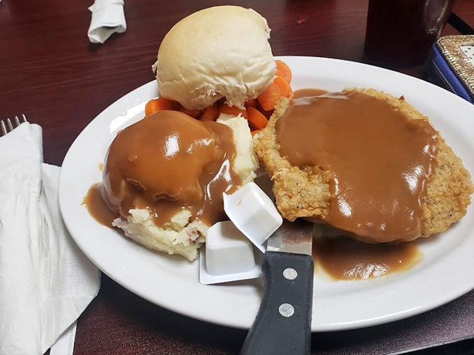 Chicken fried steak smothered in gravy that could solve international conflicts. Two countries at war? Sit them down with this plate and watch peace break out.