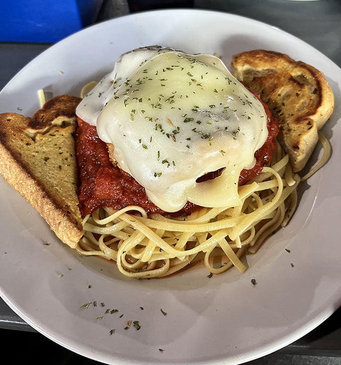 Chicken Parmesan that would make any Italian grandmother nod in approval—melted cheese, bright marinara, and perfectly al dente pasta.