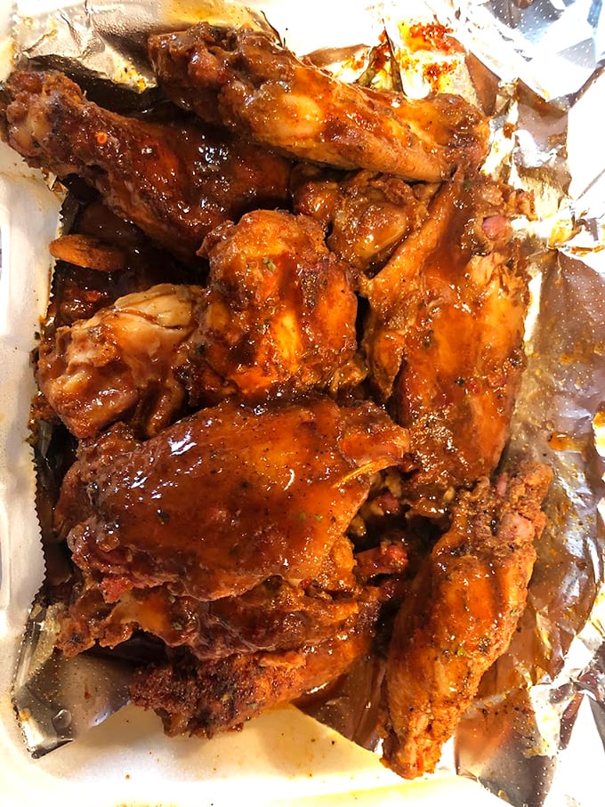 These wings aren't just smoked, they're transformed. Glistening with sauce and packed with flavor that makes you wonder why you ever ate them any other way.