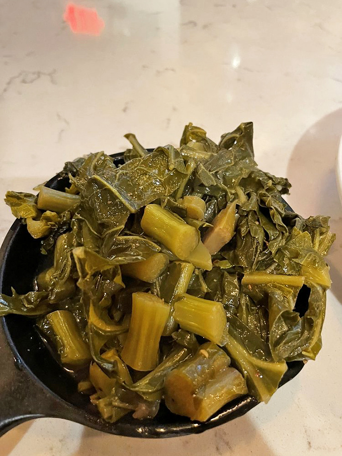 These aren't just collard greens—they're a Southern tradition simmered to tender perfection, carrying centuries of culinary wisdom in each bite.