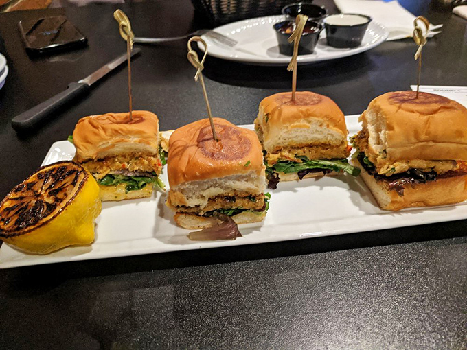 Slider perfection: four little sandwiches lined up like culinary soldiers, ready to march straight into your heart (and stomach).