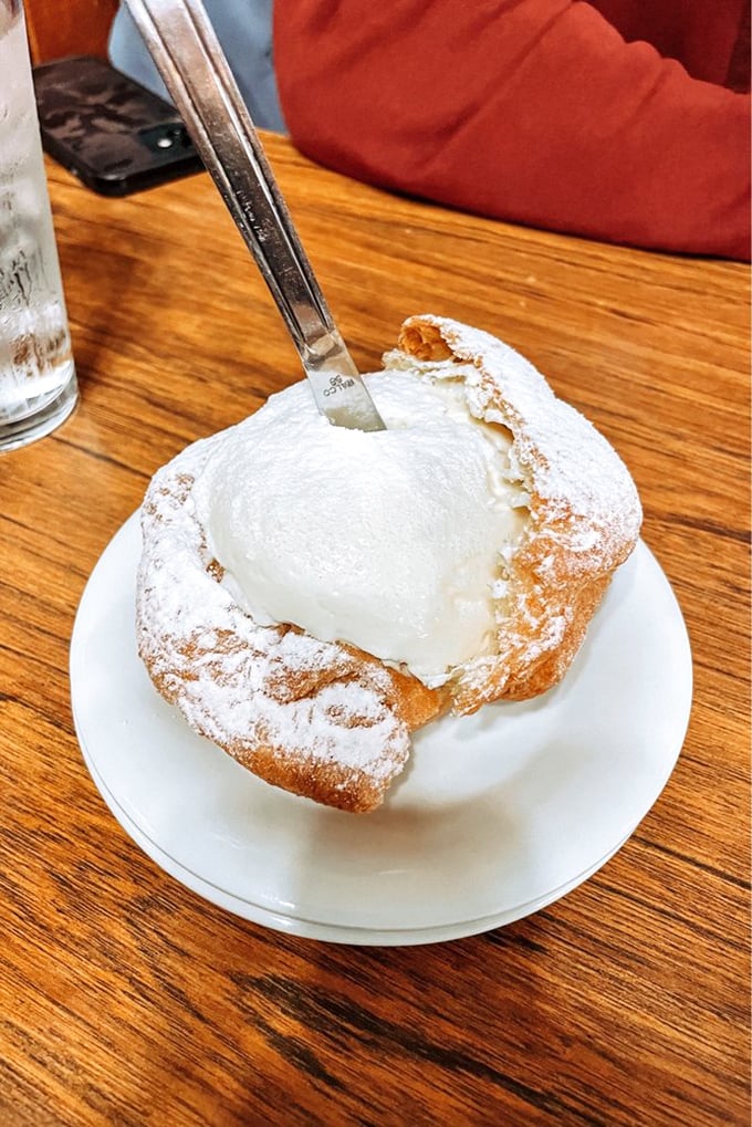 The legendary cream puff—a cloud-like pastry filled with vanilla custard so divine it's worth crossing state lines for. Diet plans, consider yourselves postponed.