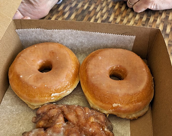 Donuts that would make Homer Simpson weep with joy—pillowy, glazed perfection that's worth every minute of the treadmill time you'll need tomorrow.