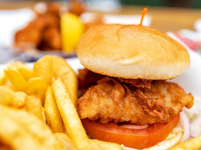 The fish sandwich—where local rock cod gets dressed up like a burger but maintains its seafood dignity under a golden batter tuxedo.