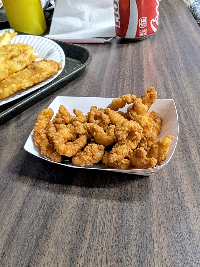 These fried clams aren't just food—they're time machines to childhood beach trips, only better because you don't have to share with siblings.