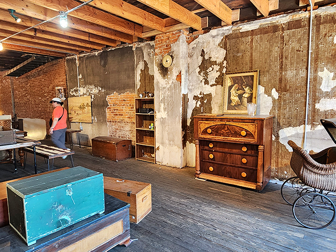 The exposed brick walls aren't just showing their age—they're displaying their character, framing furniture that's survived decades of family dinners.