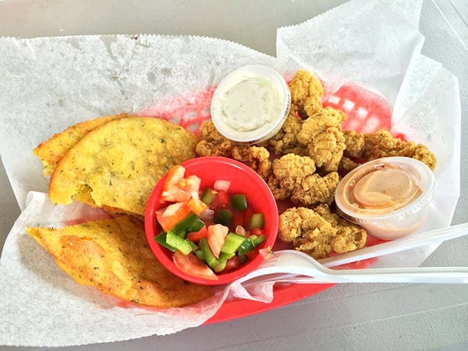 Gator nuggets that make you question why you've been wasting your life on chicken – golden-crisp outside, tender inside, and absolutely worth the drive.