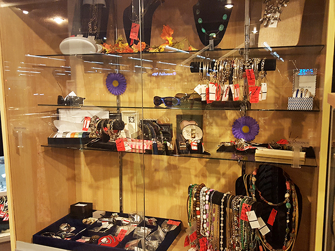 Behind glass, vintage jewelry sparkles with possibility. These accessories once adorned others and now wait patiently for new wrists, necks, and ears to complement.