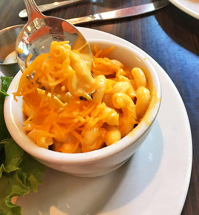 Mac and cheese that glows like a supernova of comfort—each spoonful a cheesy reminder of why simple pleasures are often the best.