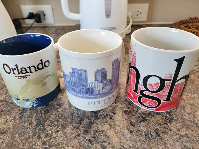 Souvenir mugs that traveled farther than most of us did last year. Orlando, Pittsburgh, and Pgh represent just a fraction of the geographical diversity.