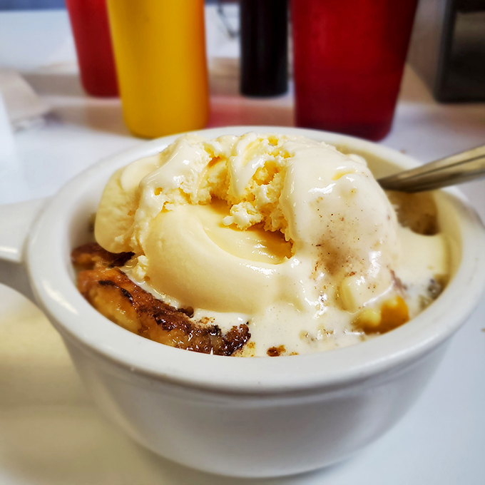 Peach cobbler that honors Georgia's favorite fruit—warm, buttery, and melting under ice cream like it's auditioning for dessert heaven.