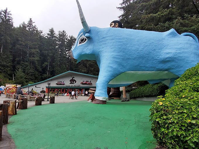 Nothing says "I acknowledge the absurdity and joy of American road trips" quite like posing with a 49-foot lumberjack.