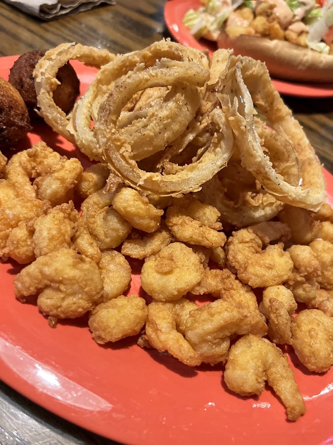 Popcorn shrimp and onion rings—the dynamic duo of fried goodness that somehow disappears from the plate while everyone claims they're "just having one more."