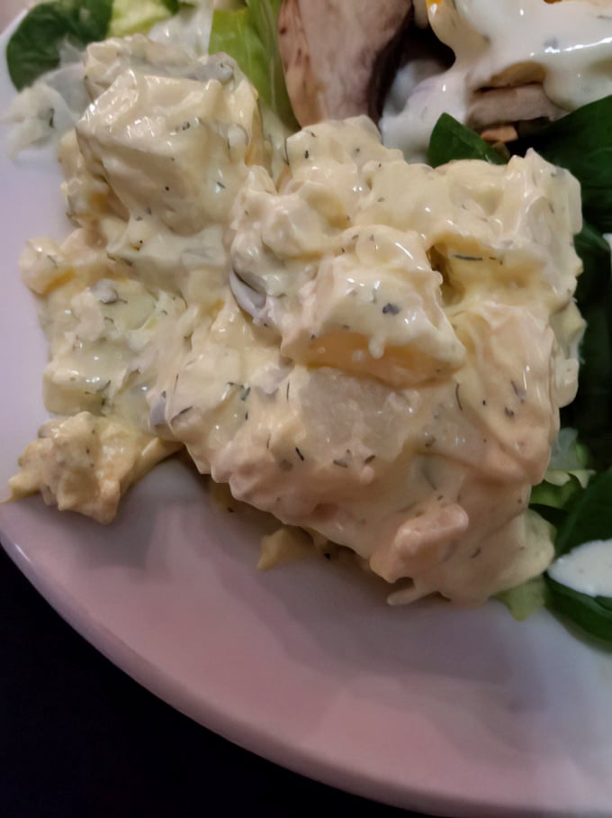 Potato salad that your grandmother would approve of—creamy, herby, and substantial enough to make a side dish feel like the main event.