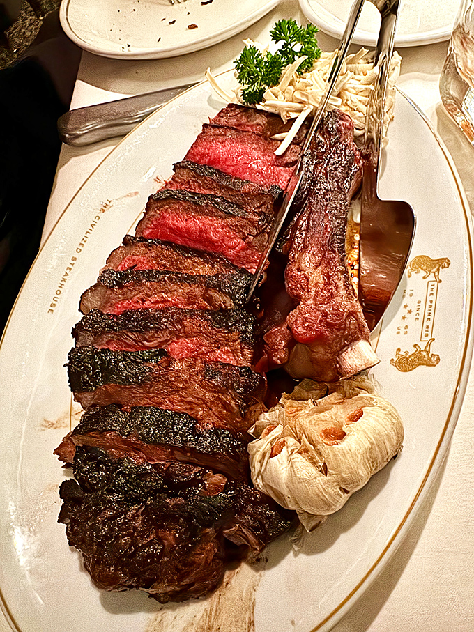 Behold the star of the show—a prime rib so perfectly cooked it makes vegetarians question their life choices. Meat poetry on a plate.