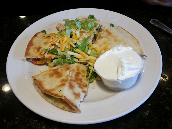 Quesadillas with a side of sour cream—proof that Parkland doesn't just master breakfast, but makes lunch worth getting out of bed for too.