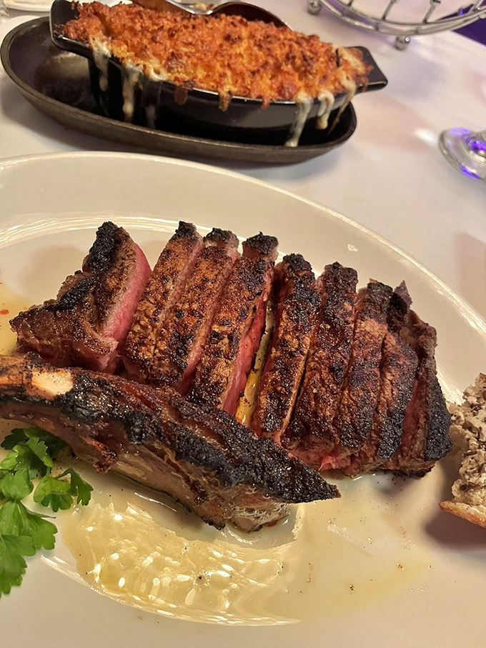 The ribeye arrives like a work of art – perfectly charred exterior, ruby-red interior. This is why cameras were invented.
