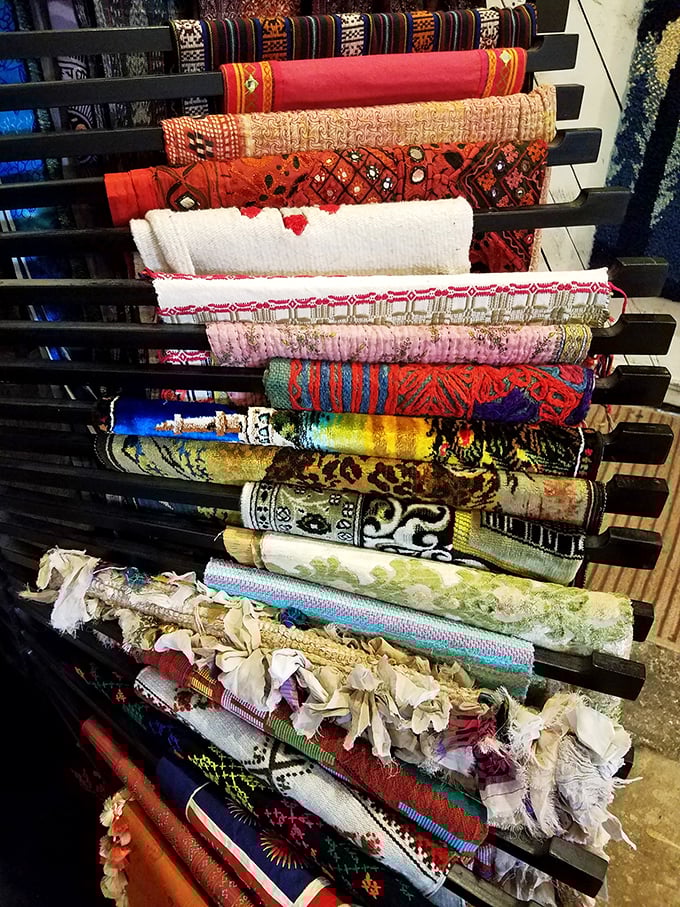 A rainbow of textiles stacked like the world's most inviting layer cake. Go ahead, pull one out – nobody's judging.